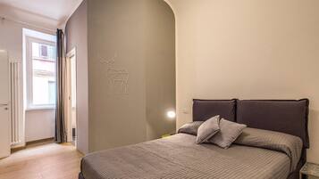 Apartamento, 2 quartos | 1 quarto, ferros/tábuas de passar roupa, Wi-Fi de cortesia
