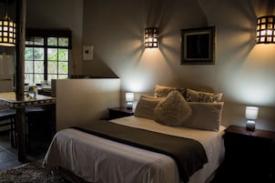 Suíte estúdio empresarial, para não fumantes, vista para o jardim (2) | Wi-Fi de cortesia, roupa de cama