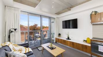 Apartamento luxo | Área de estar | Smart TV