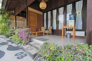 Quarto triplo luxo | Terraço/pátio