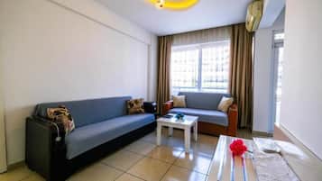 Apartamento família, sacada | Área de estar | TV LCD, pisos aquecidos