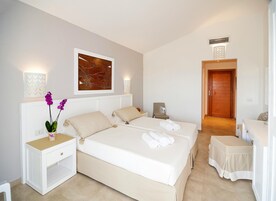 Quarto luxo | 1 quarto, cofres nos quartos, Wi-Fi de cortesia, roupa de cama