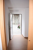 Apartamento standard, 1 quarto, varanda, no pátio | Área de estar | TV de tela plana