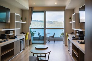 Suite Superior, vista para o mar | Roupa de alta qualidade, camas de colchão pillowtop, minibar 