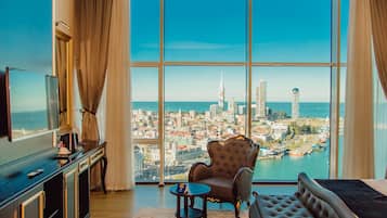 Suite Júnior, vista para o mar | 1 quarto, edredões de penas, camas de colchão Select Comfort, minibar