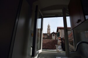 Estúdio conforto, vista para a cidade | Vista do quarto