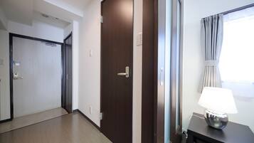 Apartamento luxo | Área de estar | TV de tela plana