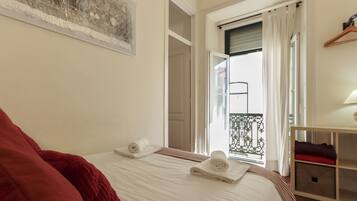 Apartamento, 2 quartos, cozinha | 2 quartos, Wi-Fi de cortesia, roupa de cama