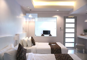 Quarto Twin Standard | Minibar, cofre no quarto, camas desdobráveis, Wi-fi grátis 