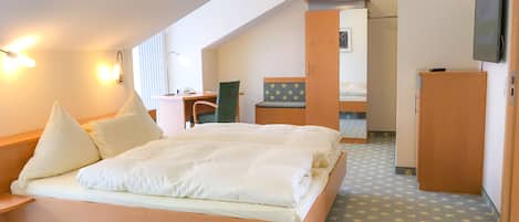 Suite de Luxo | 1 quarto, minibar, cofre com capacidade para portátil, secretária