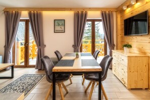 Apartamento | Sala de estar | TV de tela plana