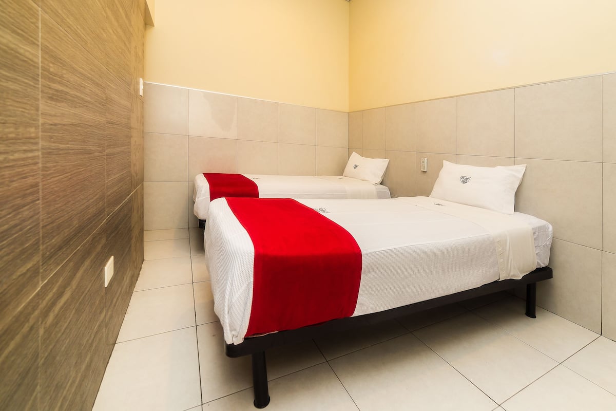 Quarto Standard, 2 camas individuais | Quartos insonorizados, ferro/tábua de engomar, Wi-fi grátis