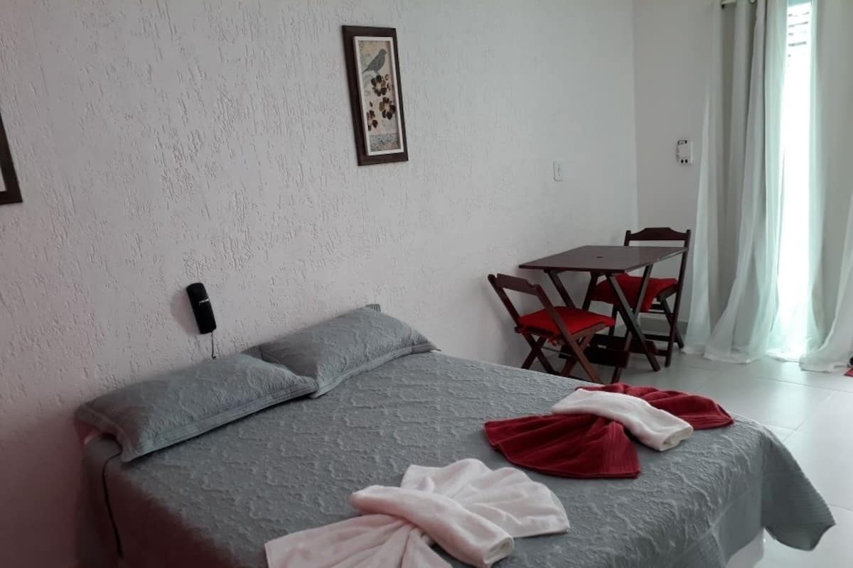 Quarto Duplo ou Twin Standard | Minibar, cortinas/cortinados opacos, Wi-fi grátis