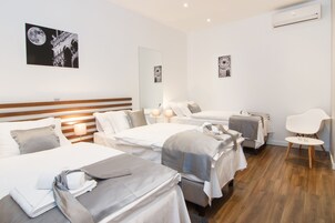 Quarto Triplo Cidade | Roupa de alta qualidade, edredões de penas 