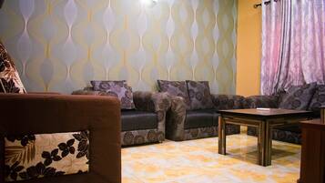 Apartamento, 1 quarto | Área de estar