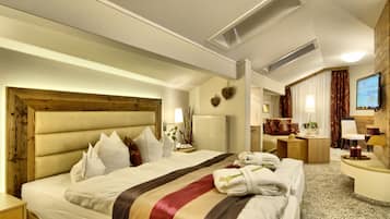 Suite Superior | Roupa hipoalergénica, minibar, cofre no quarto, secretária
