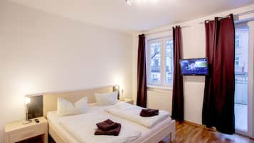 Apartamento, terraço | Quartos insonorizados, internet com fios grátis