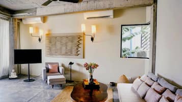 Apartamento conforto | Sala de estar | TV, DVD player