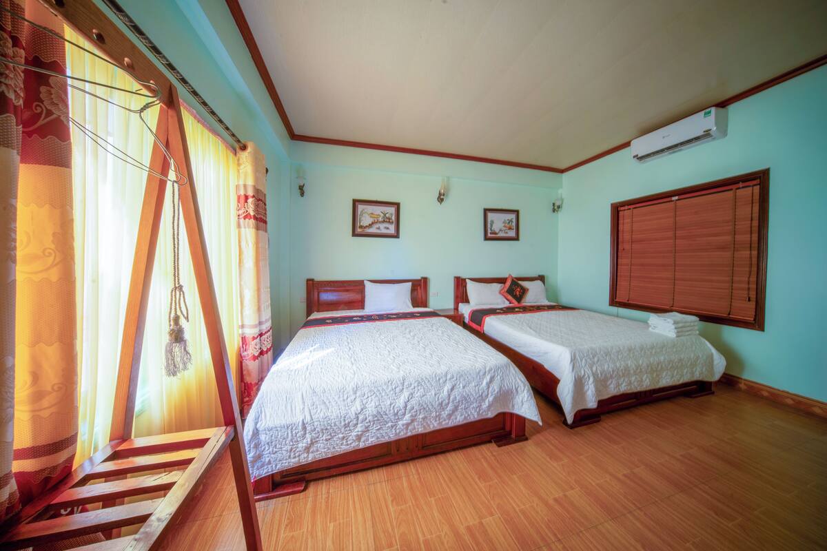 Quarto Familiar, varanda | Minibar, secretária, quartos insonorizados, Wi-fi grátis 