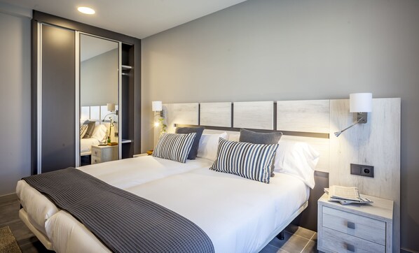 Minibar, secretária, quartos insonorizados, ferro/tábua de engomar