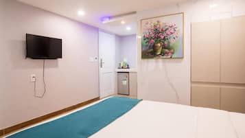 Quarto casal standard | Frigobar, escrivaninha, quartos à prova de som, Wi-Fi de cortesia