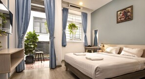 Quarto Duplo, varanda | Minibar, secretária, camas desdobráveis, Wi-fi grátis 