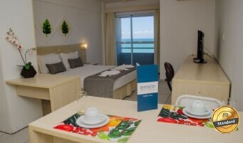 Quarto casal ou duplo standard, de frente para o oceano | Frigobar, cofres nos quartos, escrivaninha, cortinas blackout