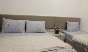 Apartamento, 3 quartos | 3 quartos, secretária, ferro/tábua de engomar, Wi-fi grátis 