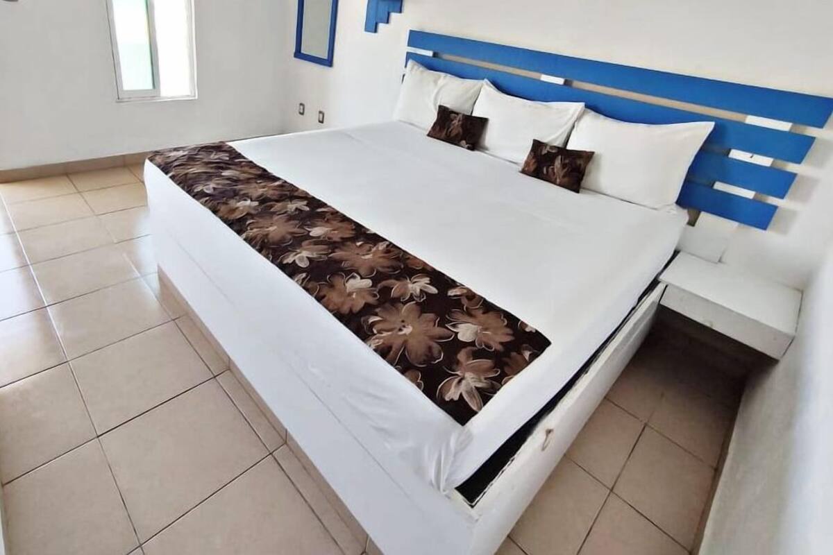 Quarto casal júnior, vista para o mar | Wi-Fi de cortesia, roupa de cama