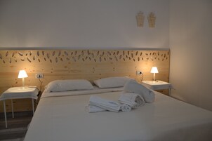 Quarto quádruplo | Frigobar, quartos à prova de som, ferros/tábuas de passar roupa