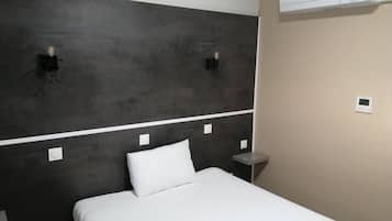Quartos à prova de som, Wi-Fi de cortesia, roupa de cama
