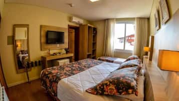 Frigobar, cortinas blackout, Wi-Fi de cortesia, roupa de cama