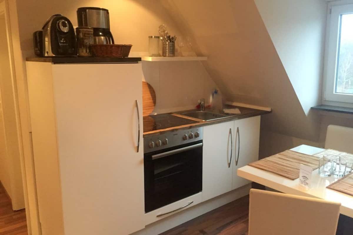 Apartamento, 2 quartos, cozinha, vista para a cidade | Cozinha privada | Máquina de café expresso, cafeteira/chaleira