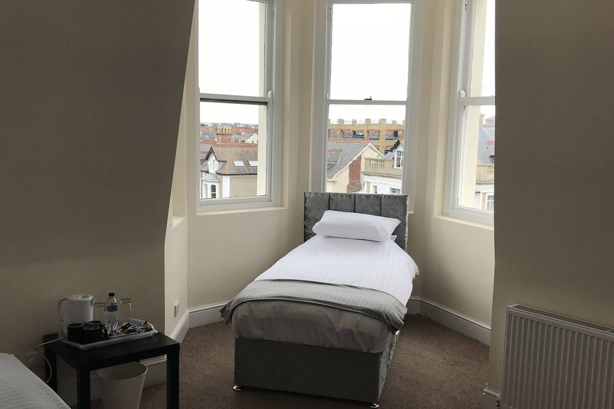 Quarto Deluxe | 1 quarto, ferro/tábua de engomar, roupa de cama fornecida