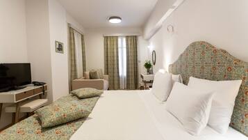 Quarto família | 1 quarto, frigobar, individualmente decorados