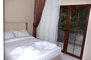 Quartos à prova de som, Wi-Fi de cortesia, roupa de cama