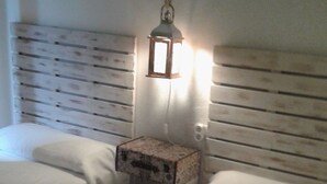 Quarto duplo, banheiro compartilhado