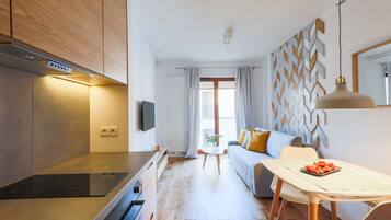 Apartamento Clássico, 1 quarto | Sala de estar | TV de ecrã plano