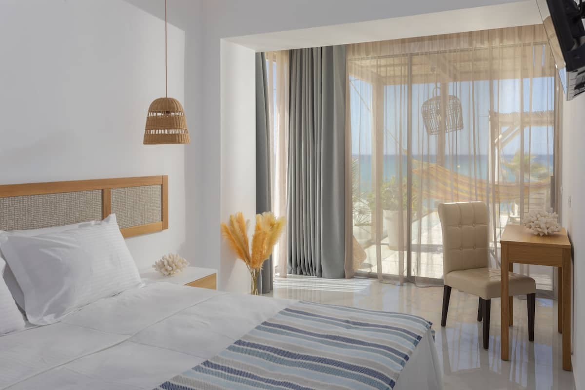 Suite, vista para o mar | Wi-fi grátis, roupa de cama fornecida