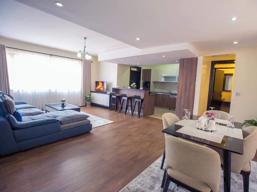 Apartamento Familiar, 1 quarto | Sala de estar | Smart TV