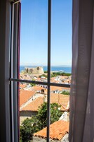 Quarto Triplo Deluxe, vista para o mar, em frente ao mar | Vista do quarto