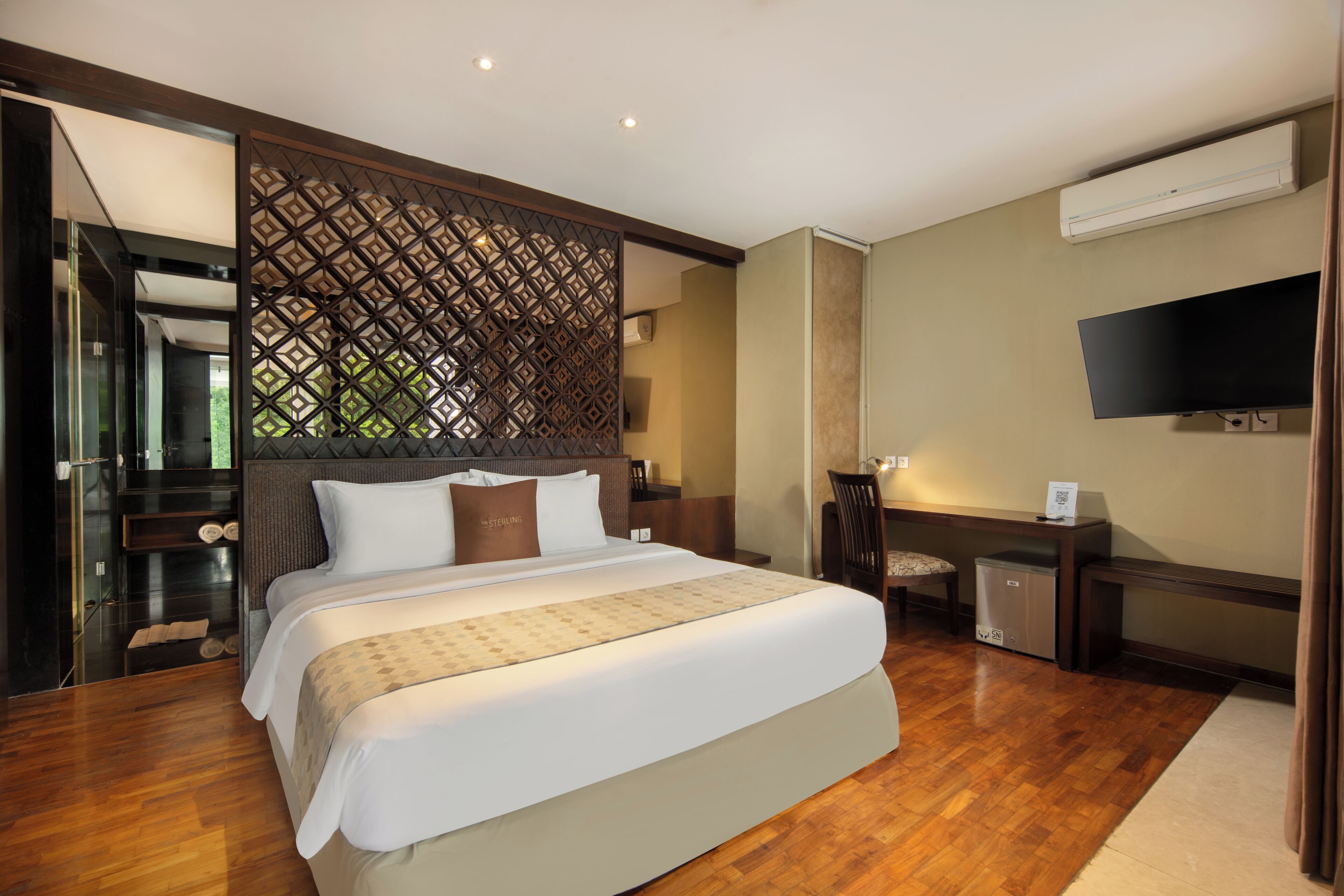 3 quartos, minibar, cofre no quarto, secretária 