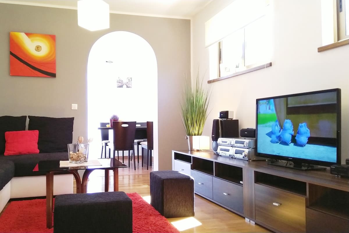 Apartamento, terraço | Área de estar | TV LCD, DVD player