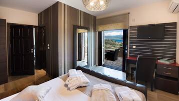 3 quartos, minibar, cofre no quarto, secretária