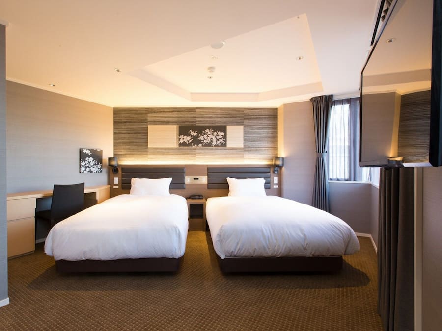 Quarto duplo luxo (large) | Roupas de cama premium, edredons de pluma, frigobar, cofres nos quartos