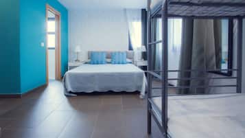 Quarto quádruplo (Jade) | 1 quarto, roupas de cama premium, frigobar, cofres nos quartos