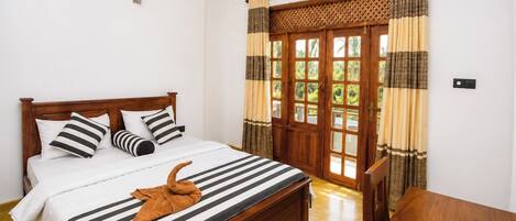 Quarto Duplo Deluxe | Cortinas/cortinados opacos, roupa de cama fornecida