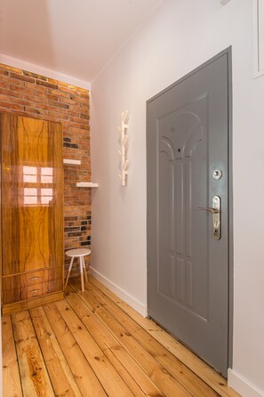 Suite-Estúdio | 1 quarto, roupa de alta qualidade, com decoração personalizada