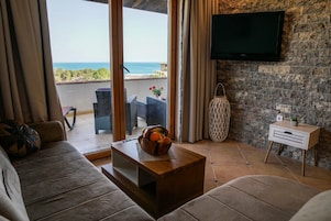 Apartamento Superior, 2 quartos, varanda | Sala de estar | Televisor LCD, aparelhagem