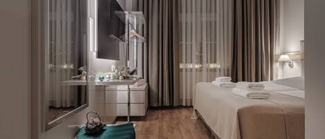 Apartamento luxo, 2 quartos | Roupas de cama premium, camas Select Comfort, quartos à prova de som